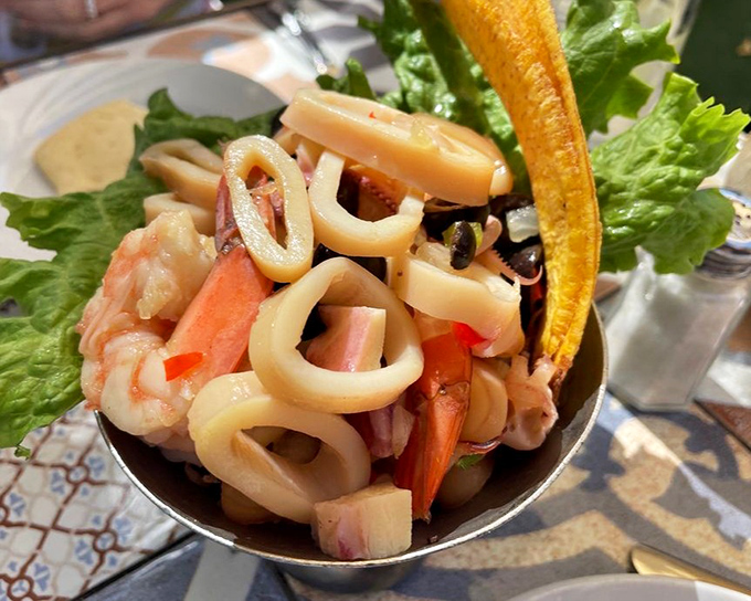 This seafood medley isn't just ceviche—it's an underwater party where shrimp, calamari and fish dance in citrus marinade.