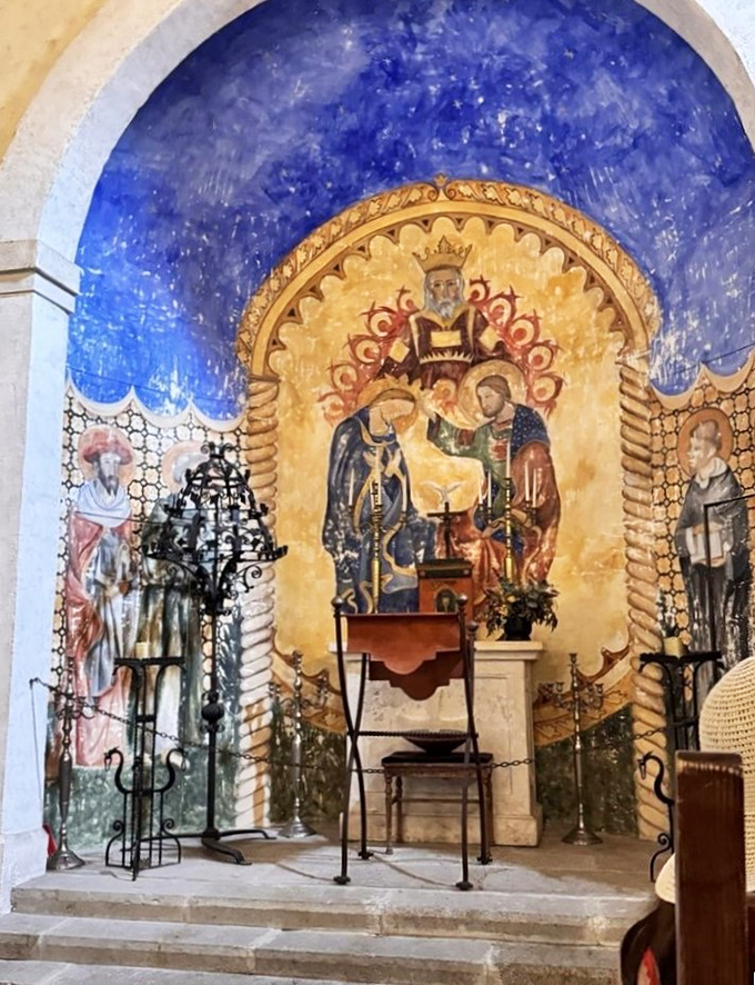 The castle chapel's vibrant frescoes and ornate altar offer a moment of reverent beauty&mdash;and perhaps a prayer that your credit card survives the gift shop.