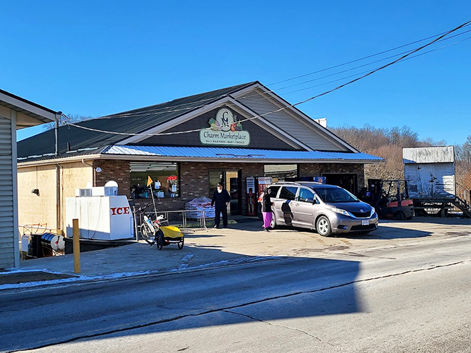 The Charm Marketplace isn't just a store—it's a community gathering spot where modern minivans and horse-drawn buggies share parking privileges.