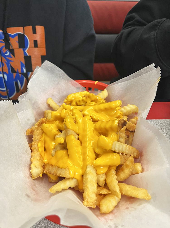 Cheese fries that don't pretend to be anything but what they are&mdash;a perfect guilty pleasure wrapped in paper and dripping with molten yellow gold.