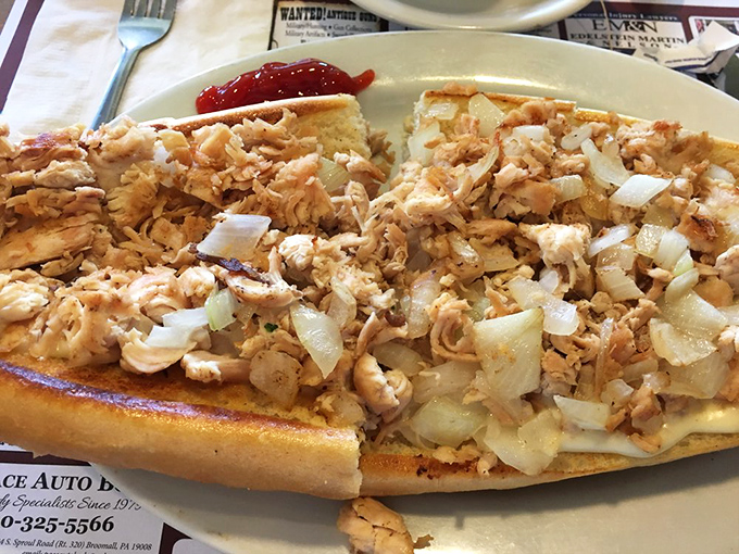 The chicken cheesesteak: Pennsylvania's casual masterpiece. Tender chicken and caramelized onions on a perfect roll&mdash;no fancy explanation needed, just enjoyment.