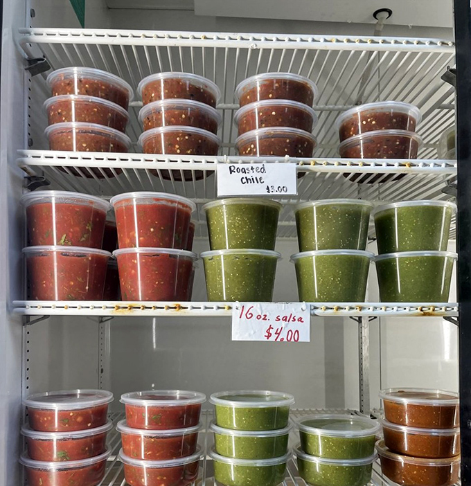 Salsa in various shades of "proceed with delicious caution." These containers hold liquid personality that transforms everything they touch.