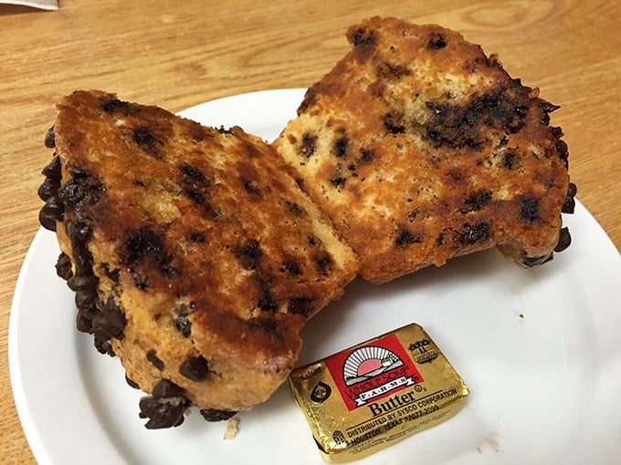 This chocolate chip muffin isn't just breakfast&mdash;it's dessert with an alibi. The butter packet is just a formality at this point.