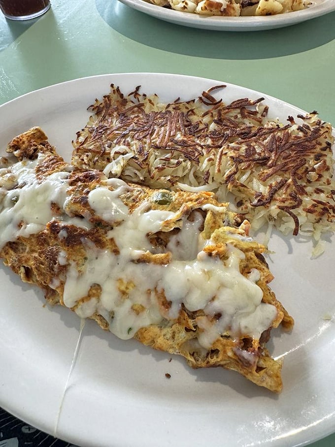 When cheese meets eggs meets chorizo, magic happens. This omelet doesn't just satisfy hunger&mdash;it banishes it to another dimension.