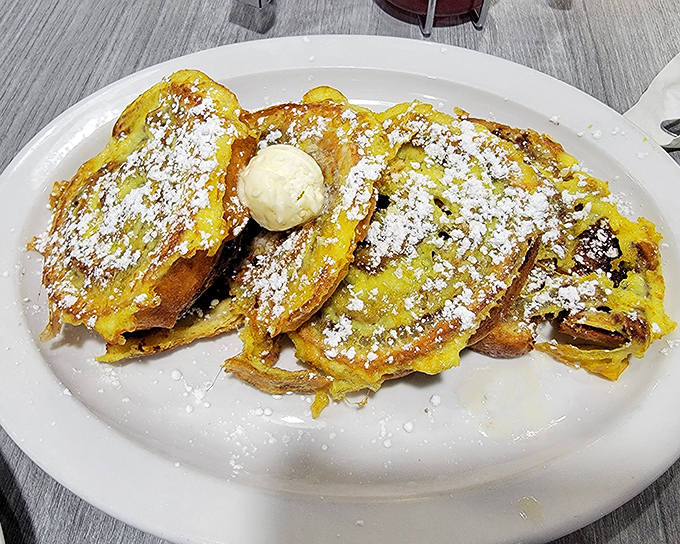 Cinnamon roll French toast elevates weekend brunch to an art form, thick and golden with perfect spice.