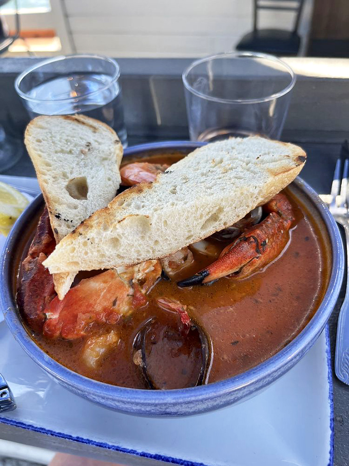 Cioppino: where tomato broth becomes a hot tub for seafood celebrities, with crusty bread standing by as eager paparazzi.