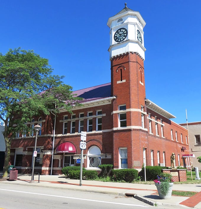 Alma's City Hall clock tower stands like a Victorian timekeeper, reminding downtown visitors they're late for absolutely nothing important. Perfect vacation vibes.