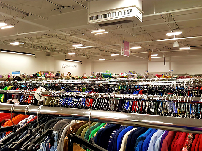 The rainbow of hanging garments stretches toward the horizon&mdash;a textile landscape where fashion finds hide in plain sight.