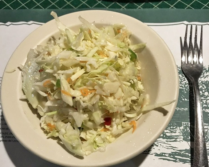 Coleslaw that knows its role &ndash; crisp, fresh, and ready to cut through the richness of whatever comfort food masterpiece you've ordered.