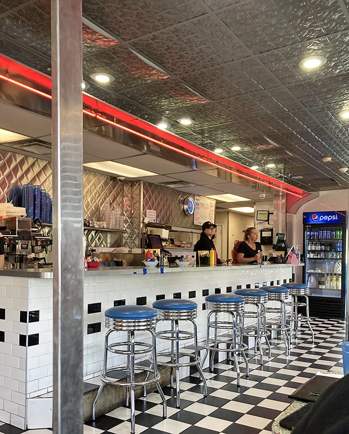 The counter where magic happens&mdash;complete with blue spinning stools that practically beg you to swivel while waiting for your order.