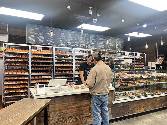 Behind the counter, where donut dreams come true and willpower goes to die. Choose wisely, or just choose everything.