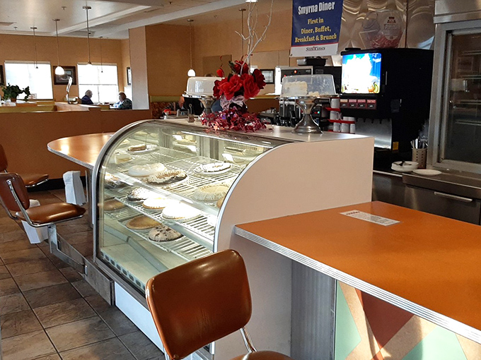 Where magic happens: the dessert counter showcasing homemade pies that have likely settled more family disputes than any mediator.