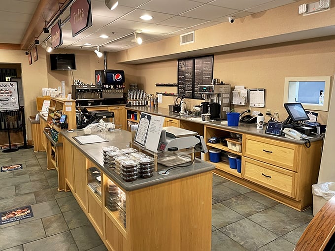 The counter stands ready for service, a command center where take-home boxes are filled with tomorrow's breakfast disguised as today's leftovers.