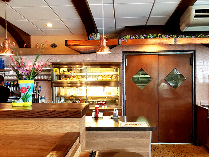 The pass-through window where culinary magic happens&mdash;where orders go in and comfort comes out with remarkable efficiency.