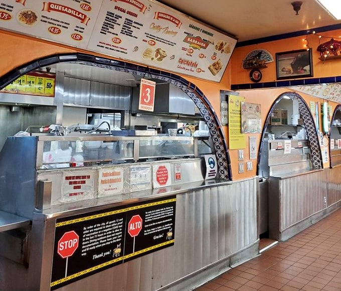 The ordering counter&mdash;where dreams are ordered, assembled with practiced efficiency, and handed over on humble paper plates.