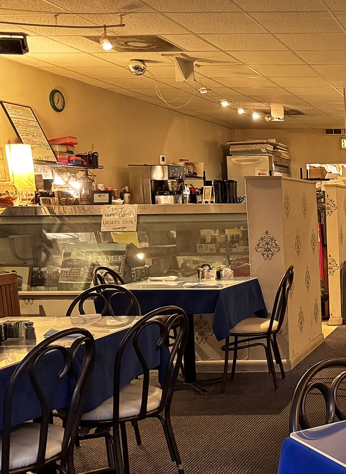The counter area offers a glimpse into the breakfast magic factory, where coffee flows freely and breakfast orders emerge transformed into morning masterpieces. 