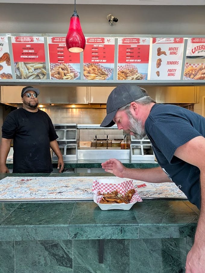 The anticipation at the counter is palpable. Like waiting for concert tickets, but the reward is crispy, juicy perfection instead of music.