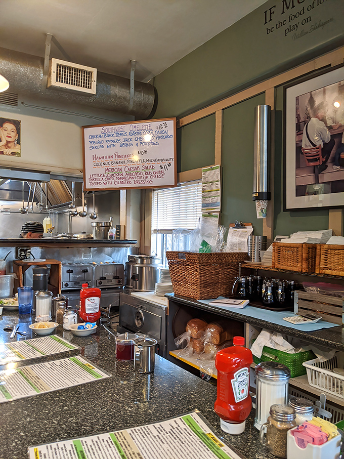 The counter offers front-row seats to the breakfast theater. Part dining experience, part culinary performance art.