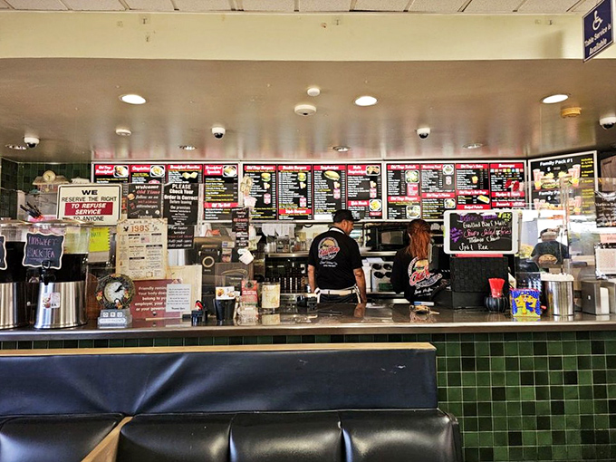 Behind this counter, culinary magic happens with practiced efficiency&mdash;where orders are called out in a shorthand language developed over decades.