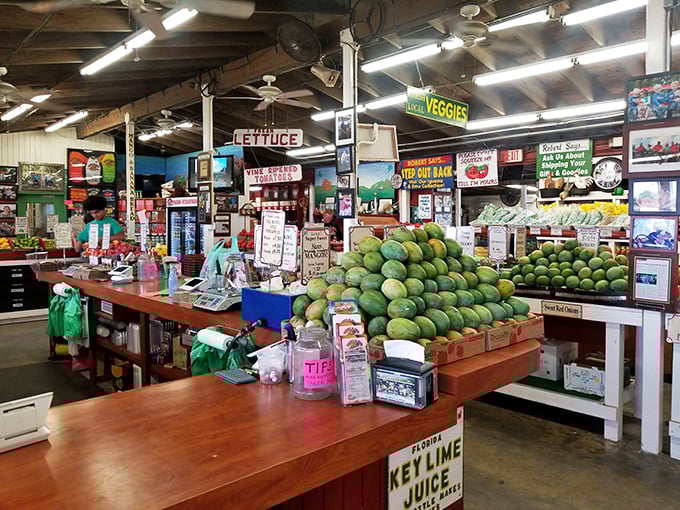 Fruit command central, where mangoes reign supreme and cash registers ring to the tune of "another tourist discovers jackfruit." 