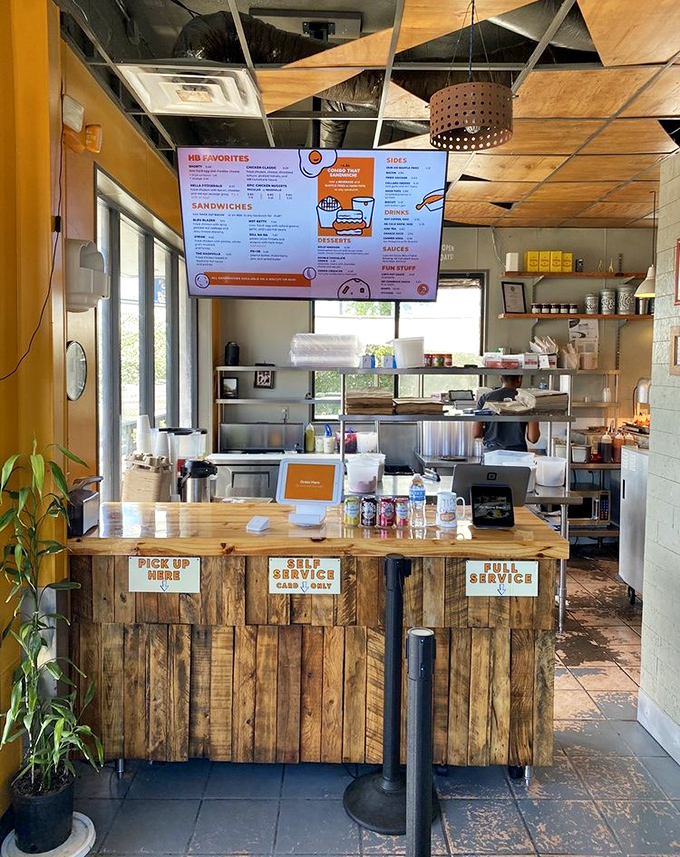 The rustic wooden counter tells you everything: this place values substance over style, though somehow they've mastered both.