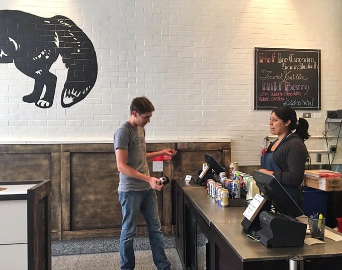 The silhouette of a bear watches over transactions at the counter&mdash;a fitting spirit animal for a place that understands comfort food is serious business.