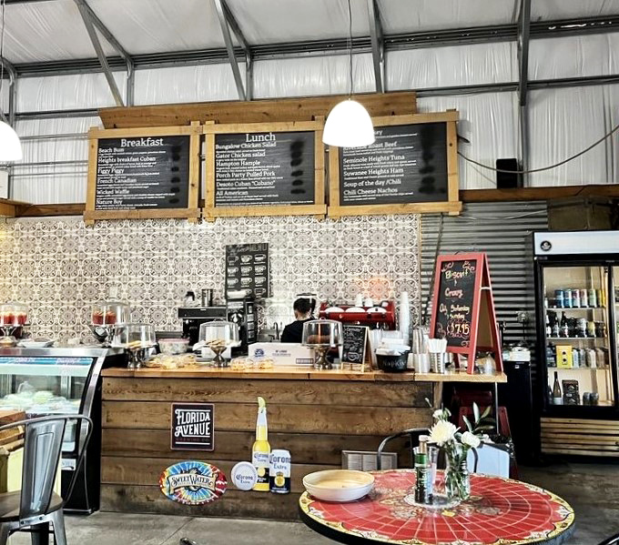 The counter where sandwich dreams come true, backed by a chalkboard menu that doesn't need fancy fonts to impress.