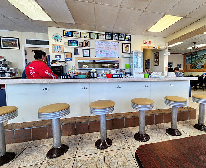 Classic diner counter seating&mdash;where solo diners become part of the community. These stools have heard more Florida Keys stories than any bestselling memoir.