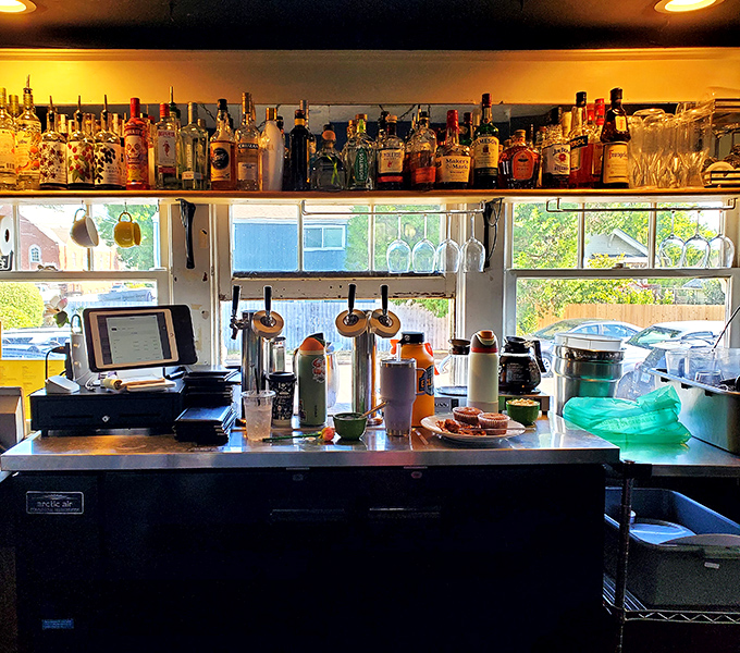 The bar where morning magic happens. Those bottles aren't just for show&mdash;brunch cocktails are serious business here.