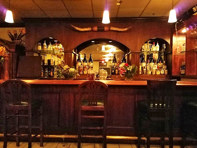 White tablecloths stretching into the distance like a snow-covered landscape, each one awaiting its starring role in someone's perfect evening.