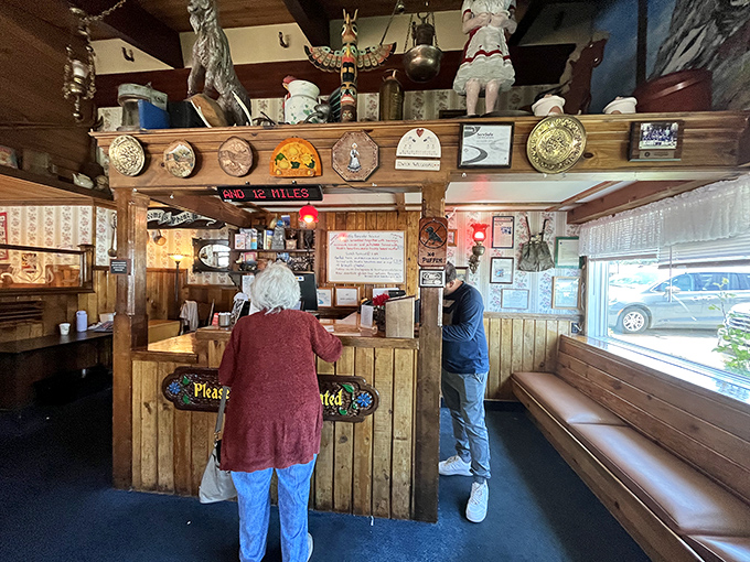 The host station isn't just where you wait&mdash;it's the gateway to pancake paradise, guarded by Alpine treasures and friendly faces.