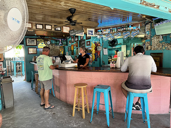 At this pink-hued counter, orders are placed, stories are shared, and the staff remembers your name faster than your in-laws do.