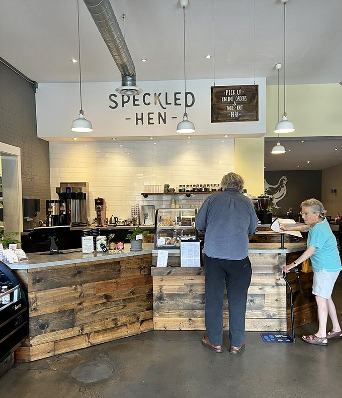 The counter where breakfast dreams come true. Rustic wood meets modern design in a space that perfectly balances farmhouse charm with contemporary coffee culture.