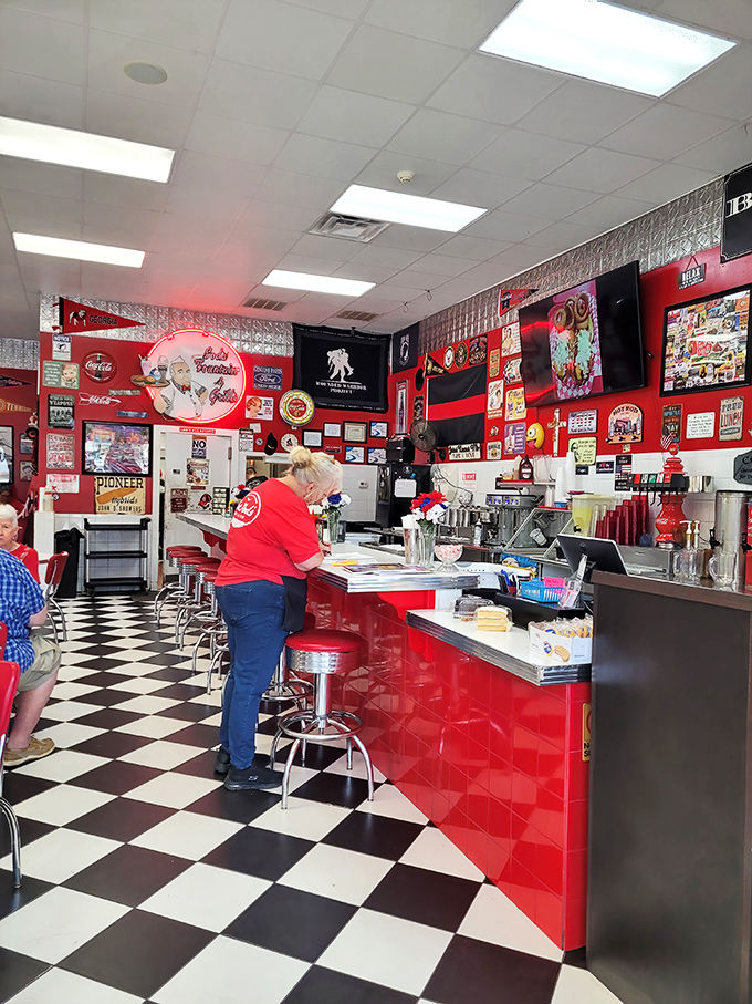 Behind this gleaming counter, milkshake magic happens. The staff doesn't just serve food&mdash;they're memory-makers in matching uniforms.