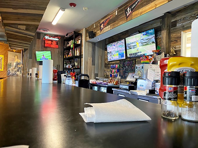 The counter view&mdash;where decisions are made, orders are called, and the choreography of comfort food unfolds before your eyes.