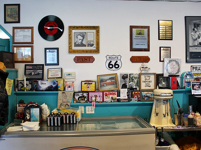 A wall of memories where Route 66 meets small-town Ohio, proving every diner needs a good story collection.