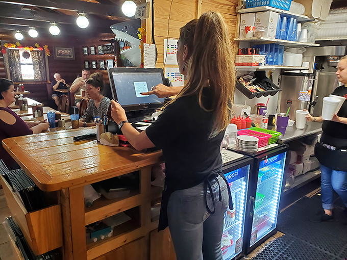 Where the magic happens: part kitchen, part theater. These folks aren't just employees; they're keepers of the flame and guardians of flavor.