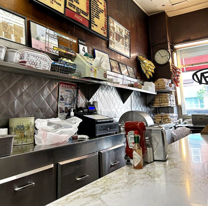 Where the magic happens. The well-worn counter and wood-paneled walls have absorbed decades of conversations, laughter, and satisfied sighs.