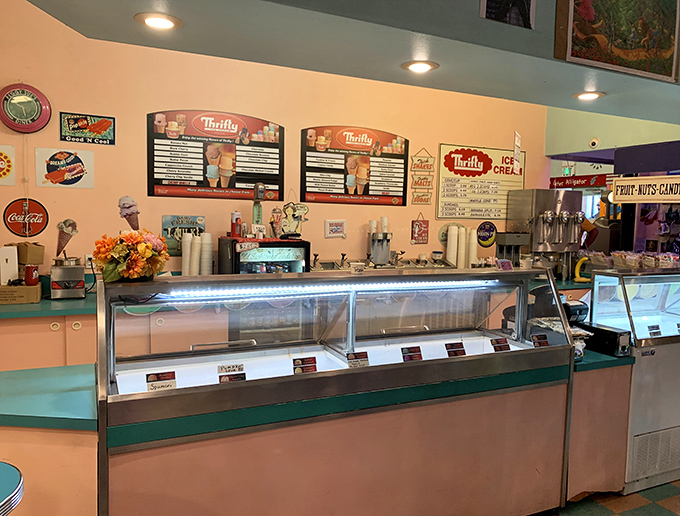 The counter area gleams with vintage charm, where turquoise-uniformed staff serve up nostalgia alongside bottomless cups of coffee.