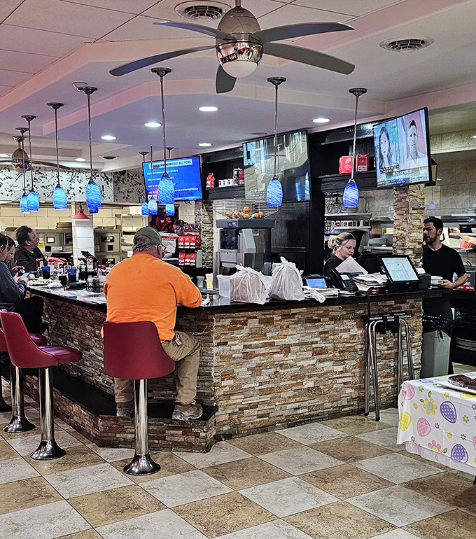 Where the magic happens—the counter area buzzes with the quiet efficiency of a restaurant that knows exactly what it's doing.