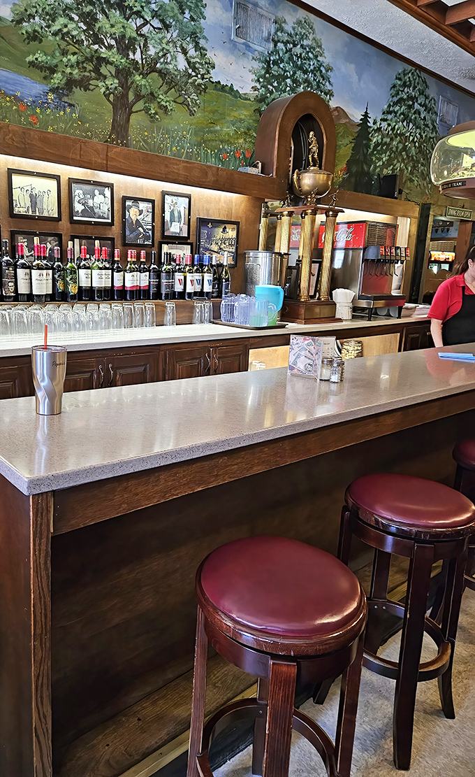 The bar area, with its worn wooden stools and trophy displays, feels like the neighborhood's living room &ndash; comfortable and welcoming.