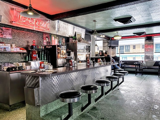 The counter where regulars have worn their initials into the seats through decades of faithful patronage. Breakfast tastes better here.