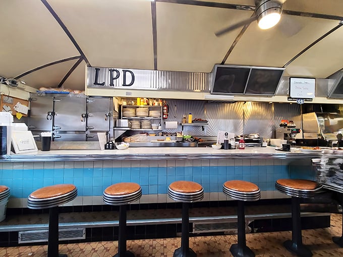 The counter seats&mdash;front-row tickets to the best show in town, where breakfast theater unfolds with the precision of a well-rehearsed Broadway production.