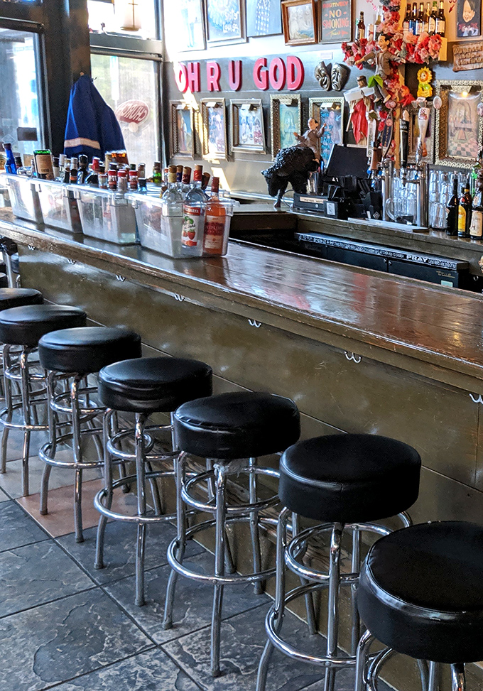 The bar area blends vintage charm with modern hospitality in perfectly imperfect harmony.