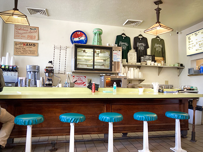 Counter seats that have witnessed countless barbecue epiphanies. The best spot in the house for watching the choreography of a well-run kitchen.