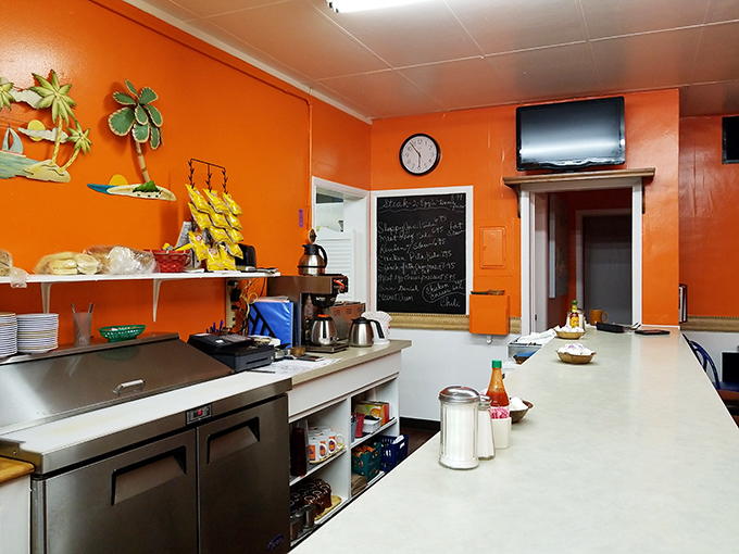 Counter seats offer front-row tickets to the breakfast show, where every order tells a story of morning rituals.