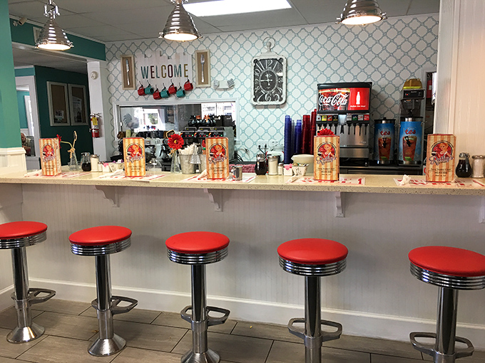 Classic counter seating that invites solo diners to feel right at home. Those red stools have supported the weight of countless Florida stories.