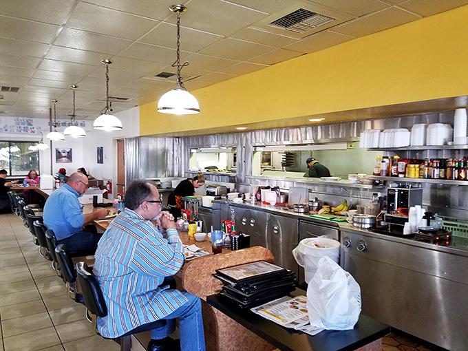 Counter seats: where solo diners become temporary members of the breakfast club, trading newspaper sections and weather observations between sips of coffee.