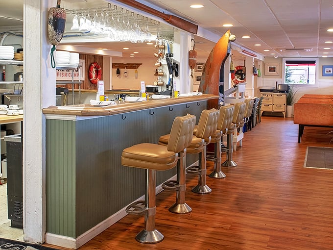 Counter seating that invites you to belly up for a front-row view of coastal cuisine&mdash;where every stool tells a story of satisfied diners past.