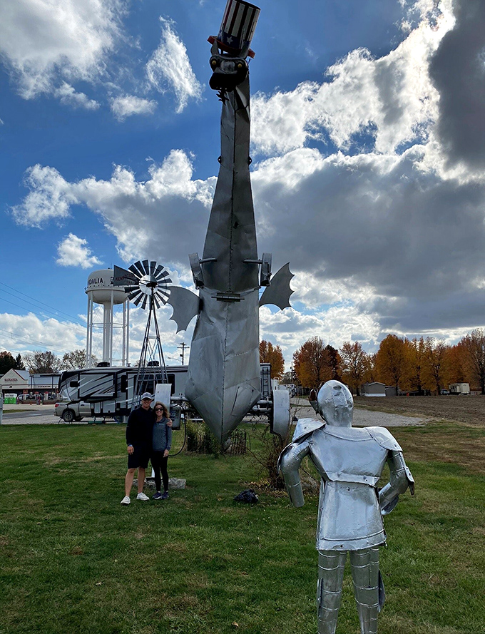 Happy travelers pose with their new favorite roadside discovery, proving that the best adventures happen off the beaten path.